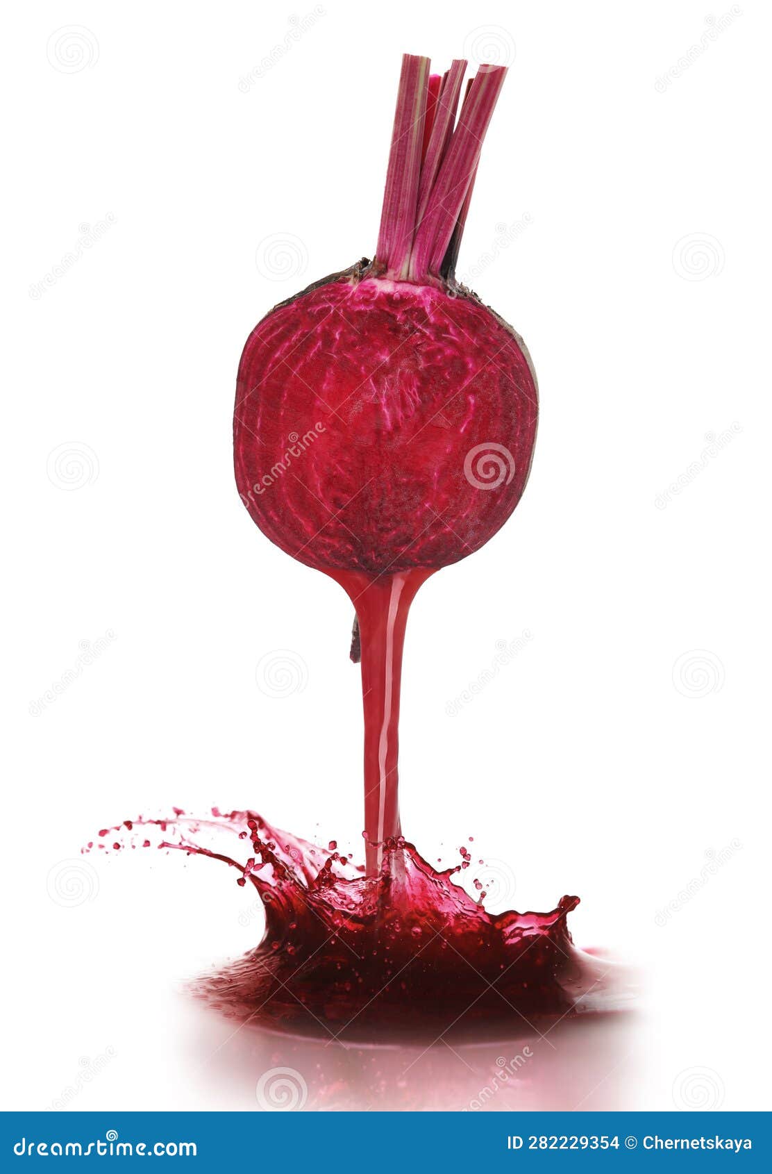 Pouring Freshly Squeezed Juice from Beetroot on White Background Stock ...