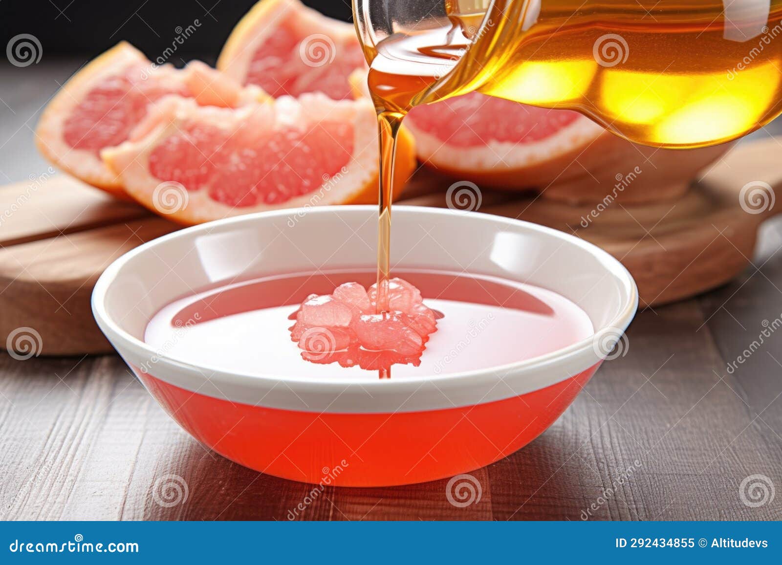 Pouring Homemade Grapefruit Syrup into a Bowl Stock Image - Image of ...