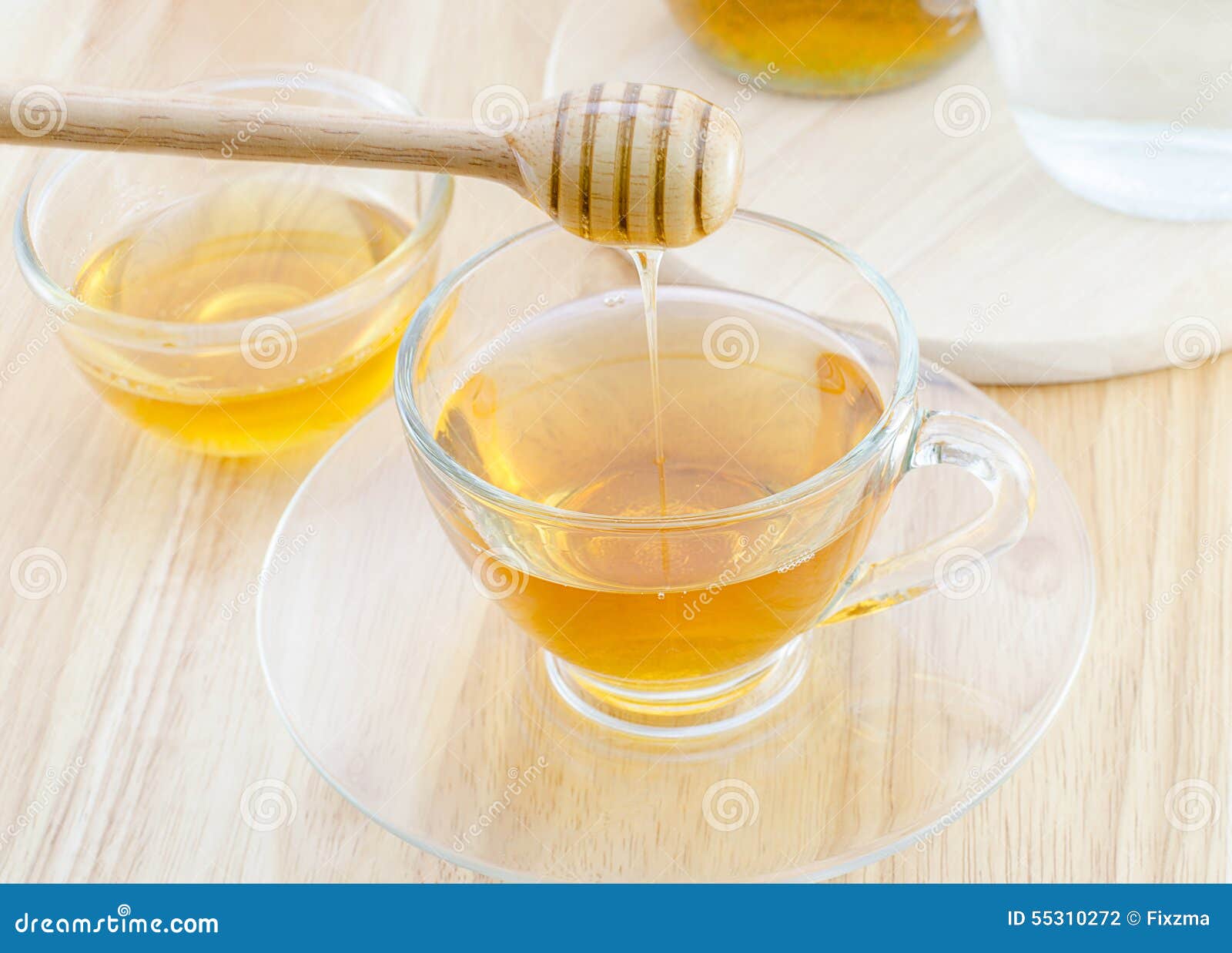 Pouring Honey into Cup of Tea on Wooden Table Stock Photo - Image of ...