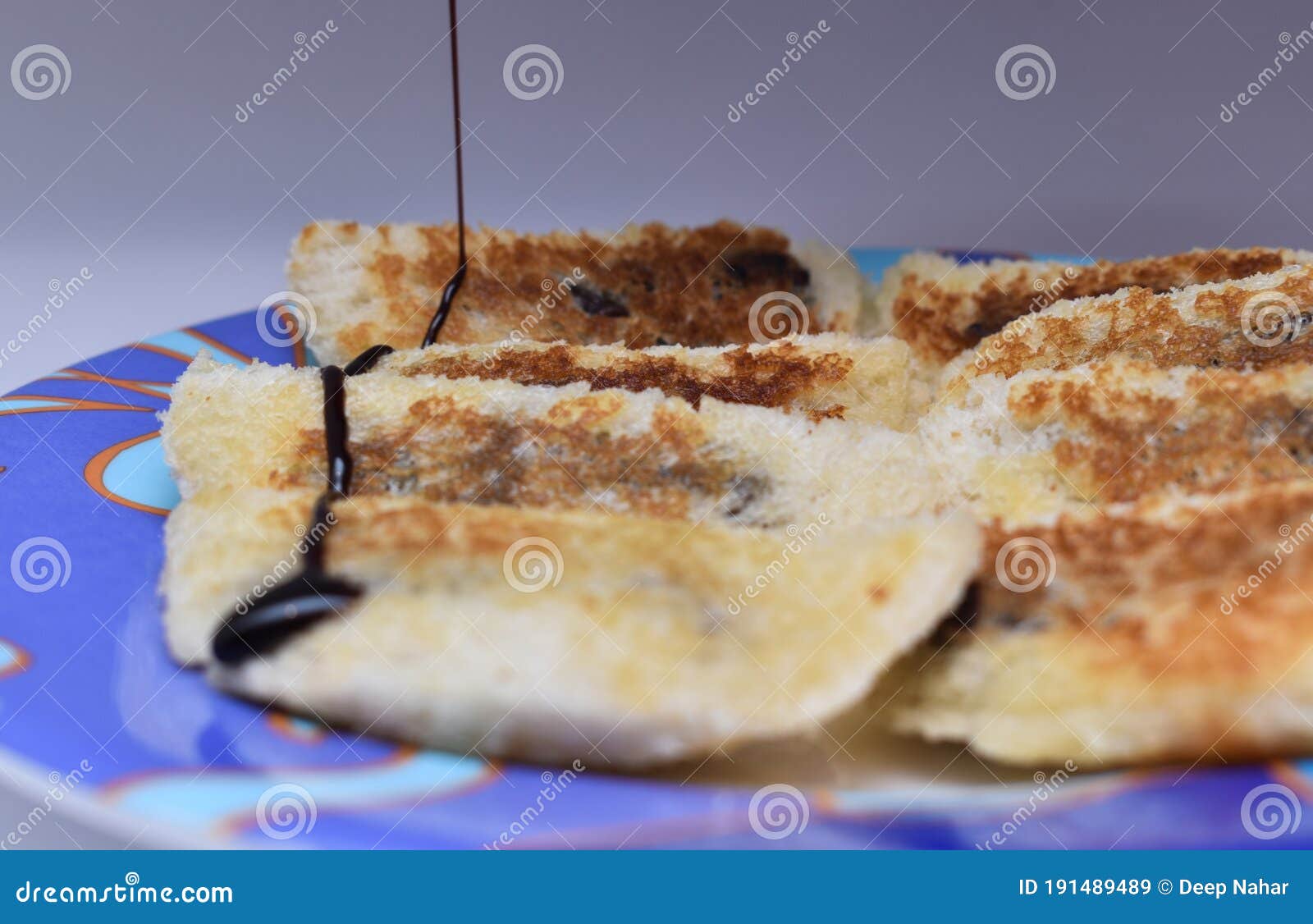 Pouring Hot Choco Lava Bread with Chocolate Syrup Stock Image - Image ...