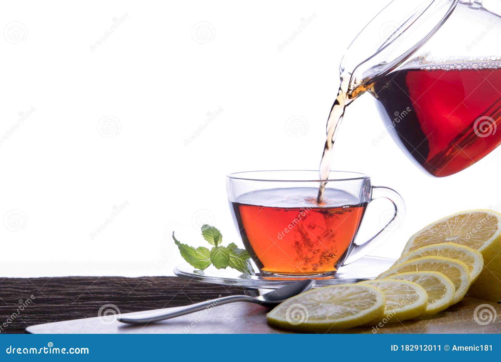 Pouring hot tea into a cup stock image. Image of herbal - 182912011