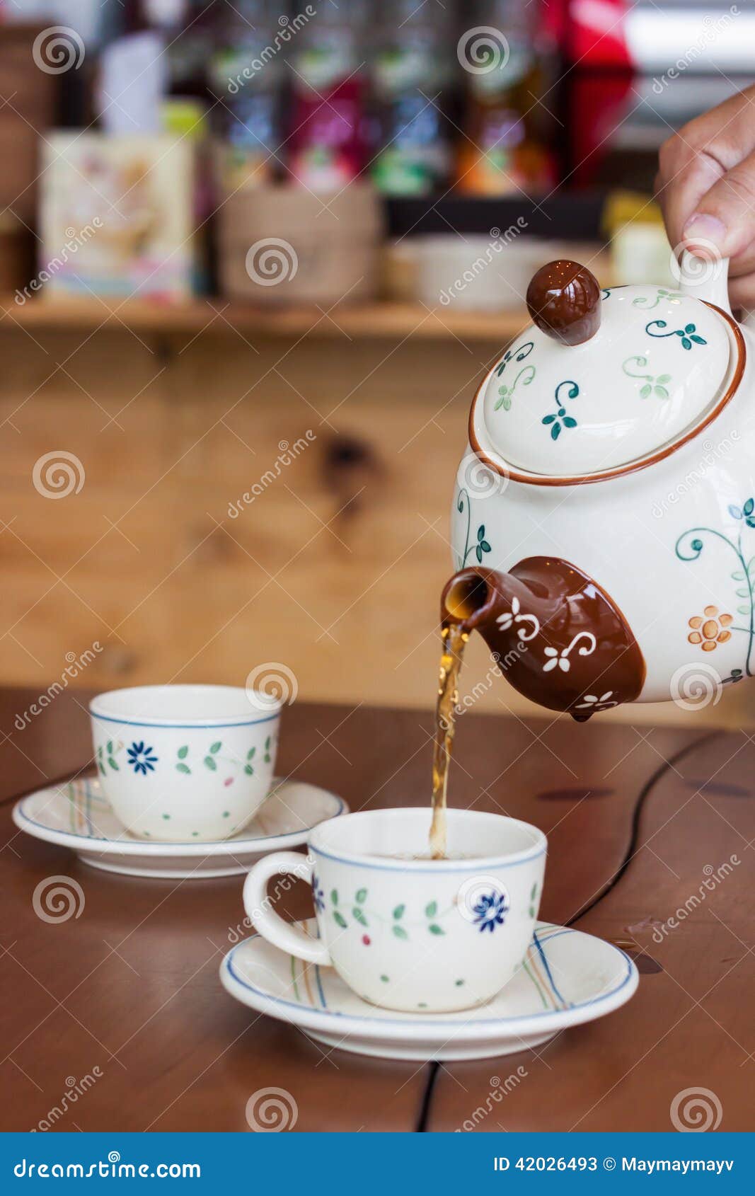 Pouring hot tea stock image. Image of light, teacup, pour - 42026493