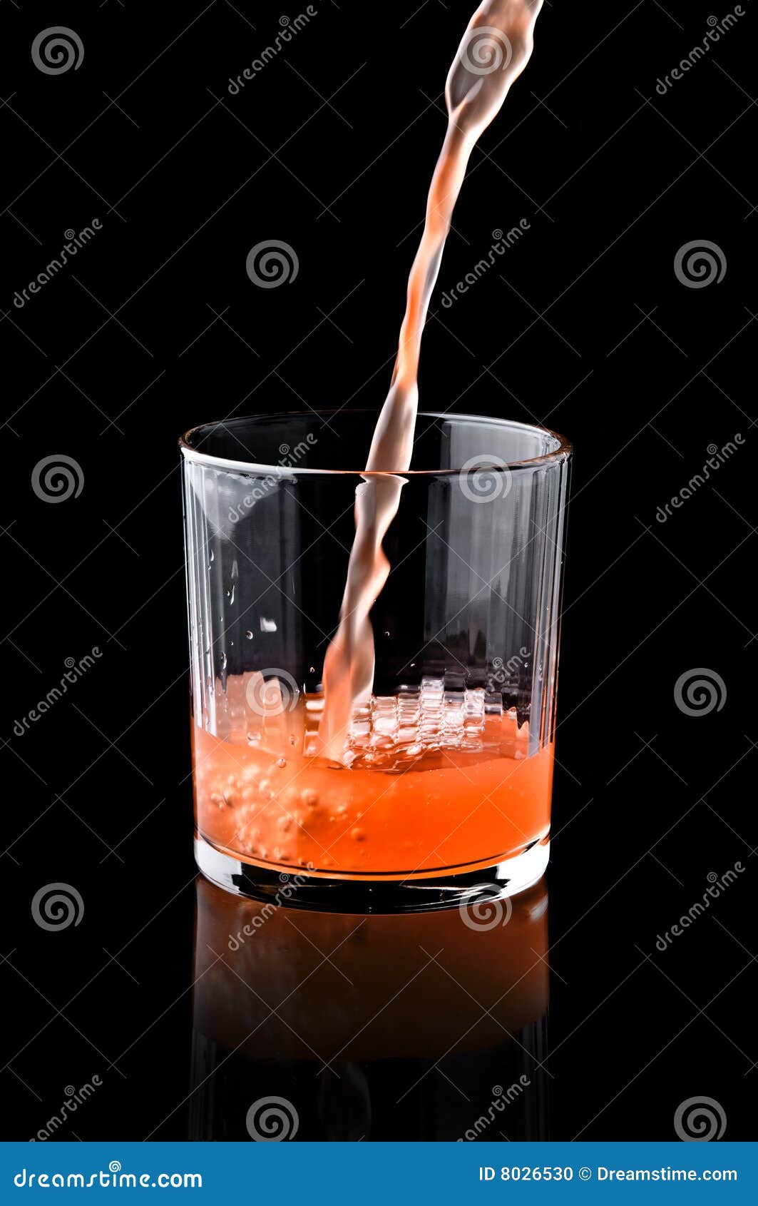 Pouring juice into a glass stock photo. Image of flow - 8026530