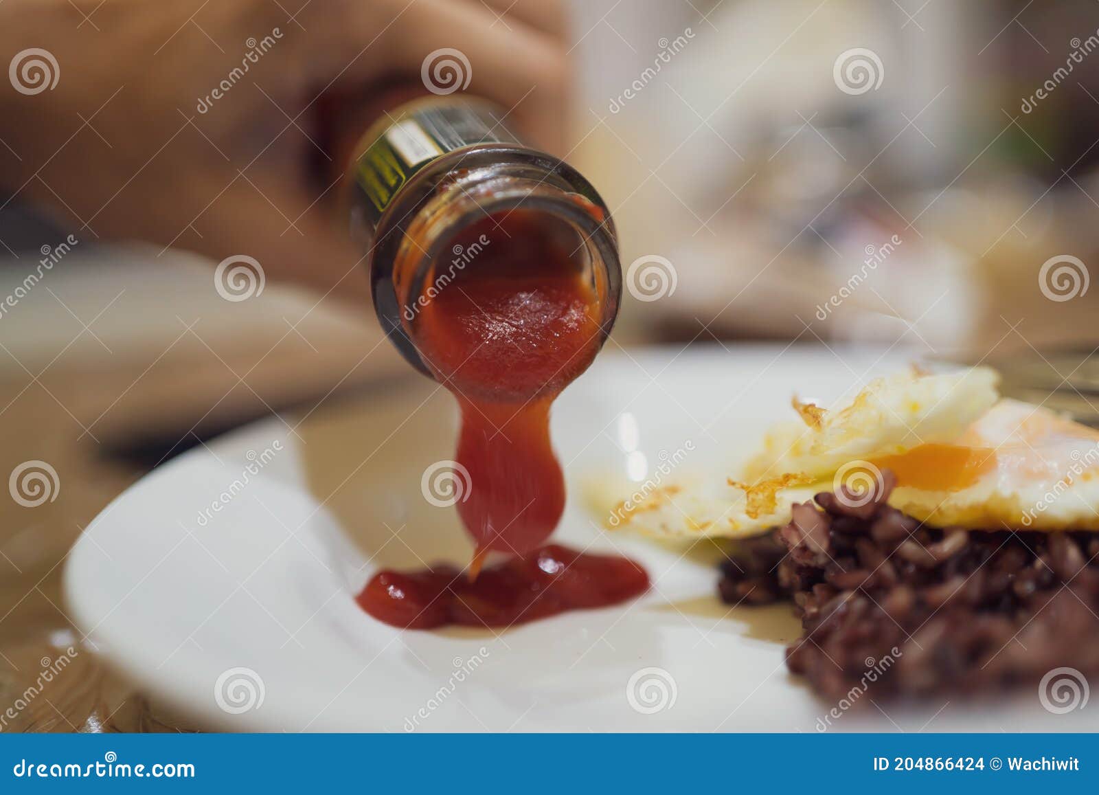 Pouring Ketchup into a Dish Stock Photo - Image of restaurant ...