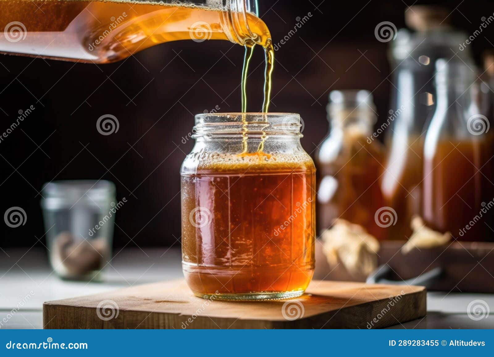 Pouring Kombucha Tea into a Glass from a Tap Stock Image - Image of ...