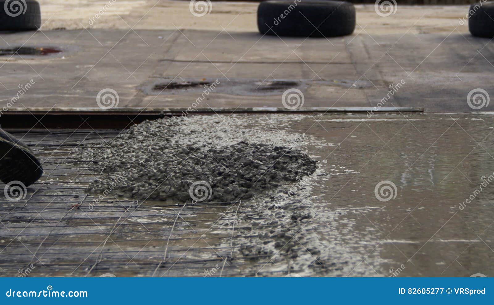 Pouring Laying Concrete At The Construction Site Using Buckets Of