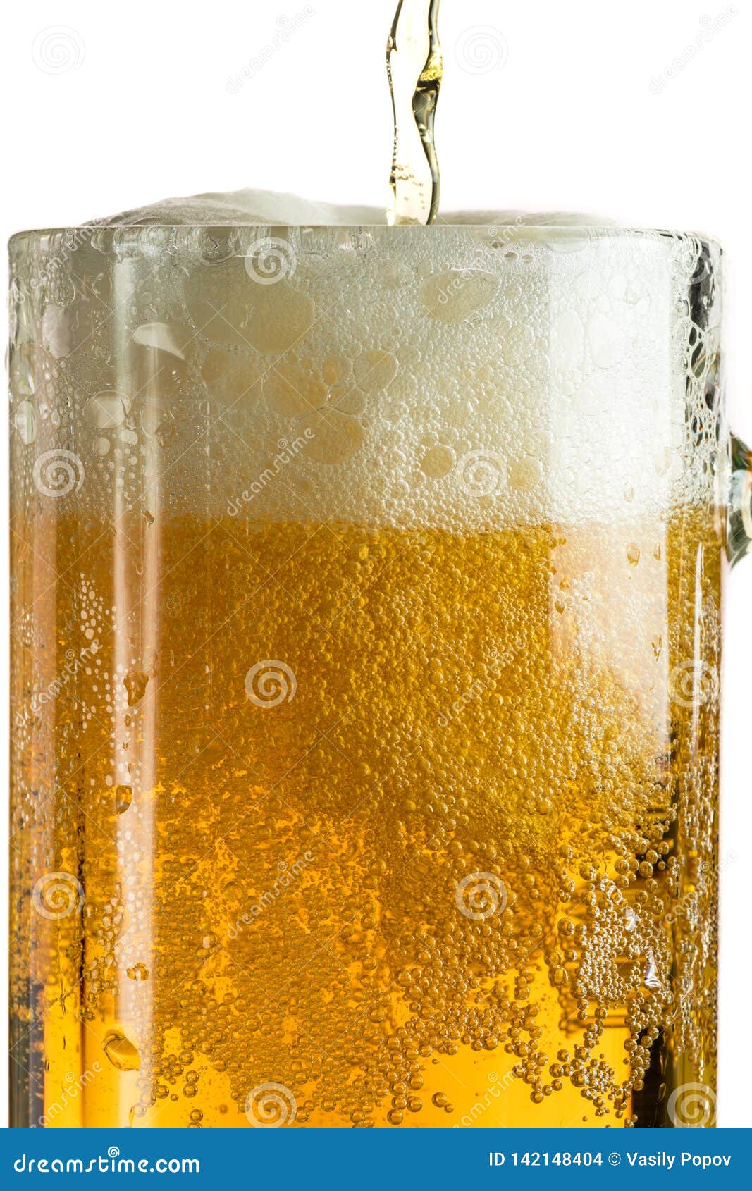 Pouring Light Beer in a Beer Mug, it Turns Out Foam and Spray Stock ...