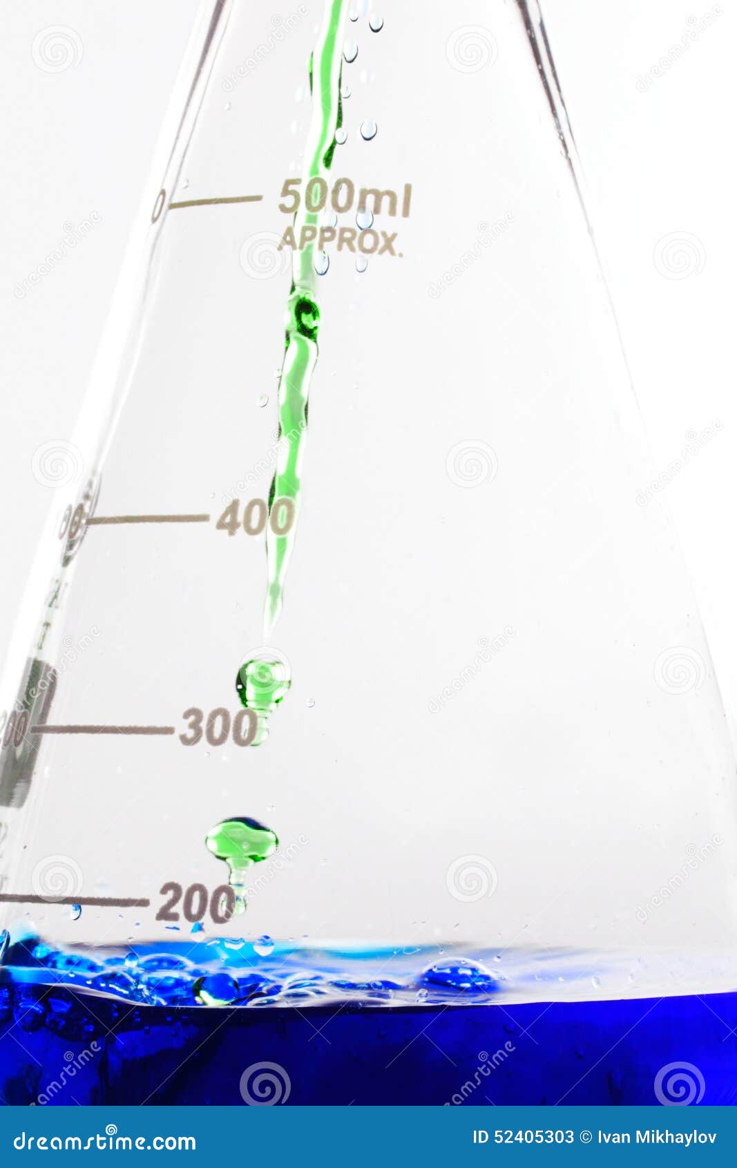 Pouring liquid into flask stock image. Image of science - 52405303