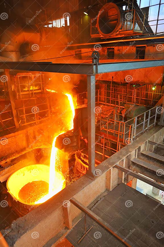 Pouring of liquid metal stock image. Image of heavy, liquid - 25444881