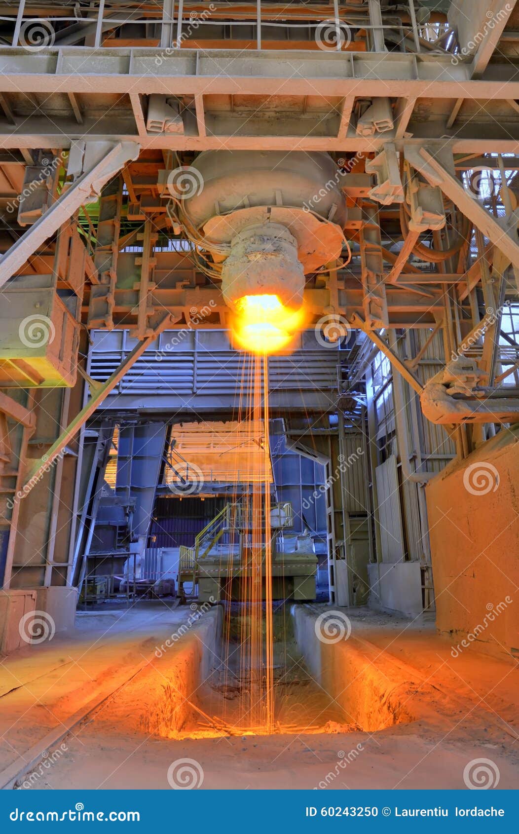 Pouring of liquid metal stock photo. Image of factory - 60243250