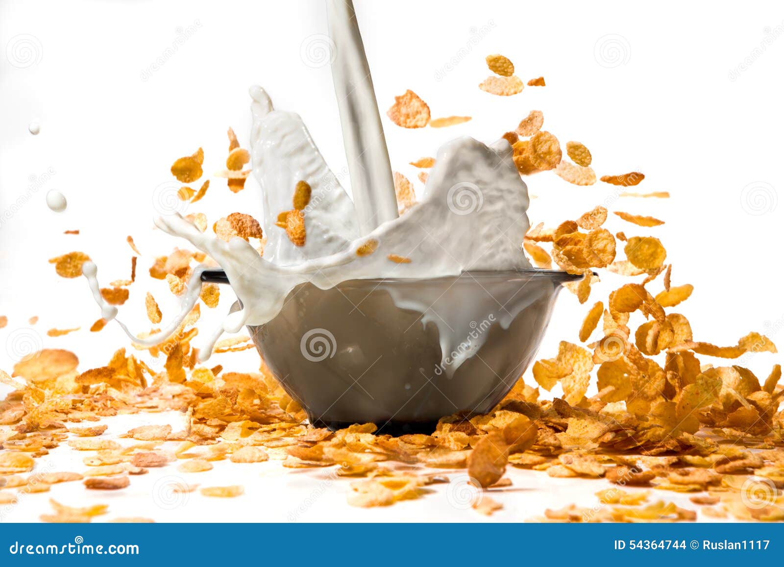 Pouring Milk into Corn Flakes Creating Splash Stock Photo - Image of ...