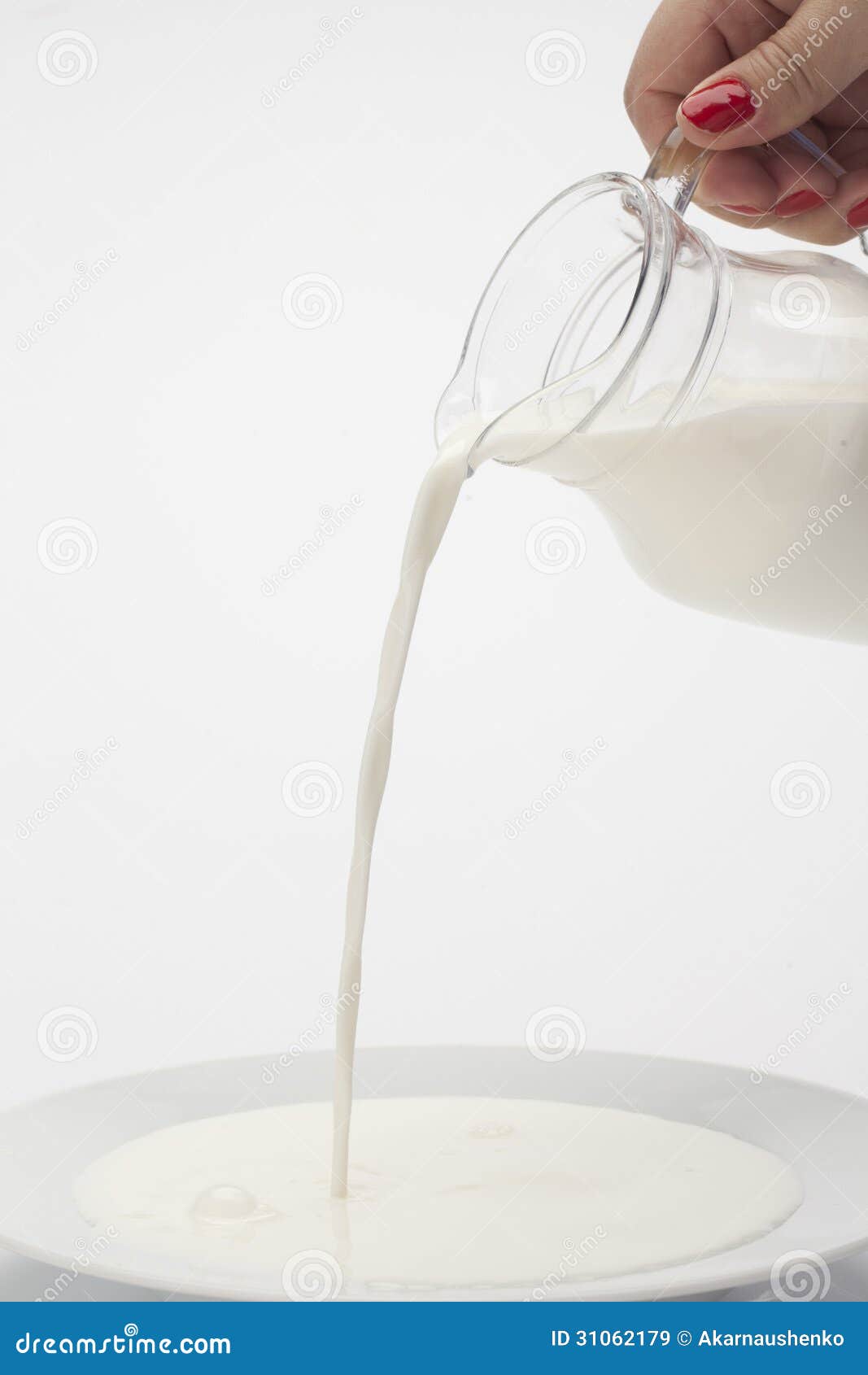 Pouring of Milk from Jug into a ... Stock Image - Image of close ...