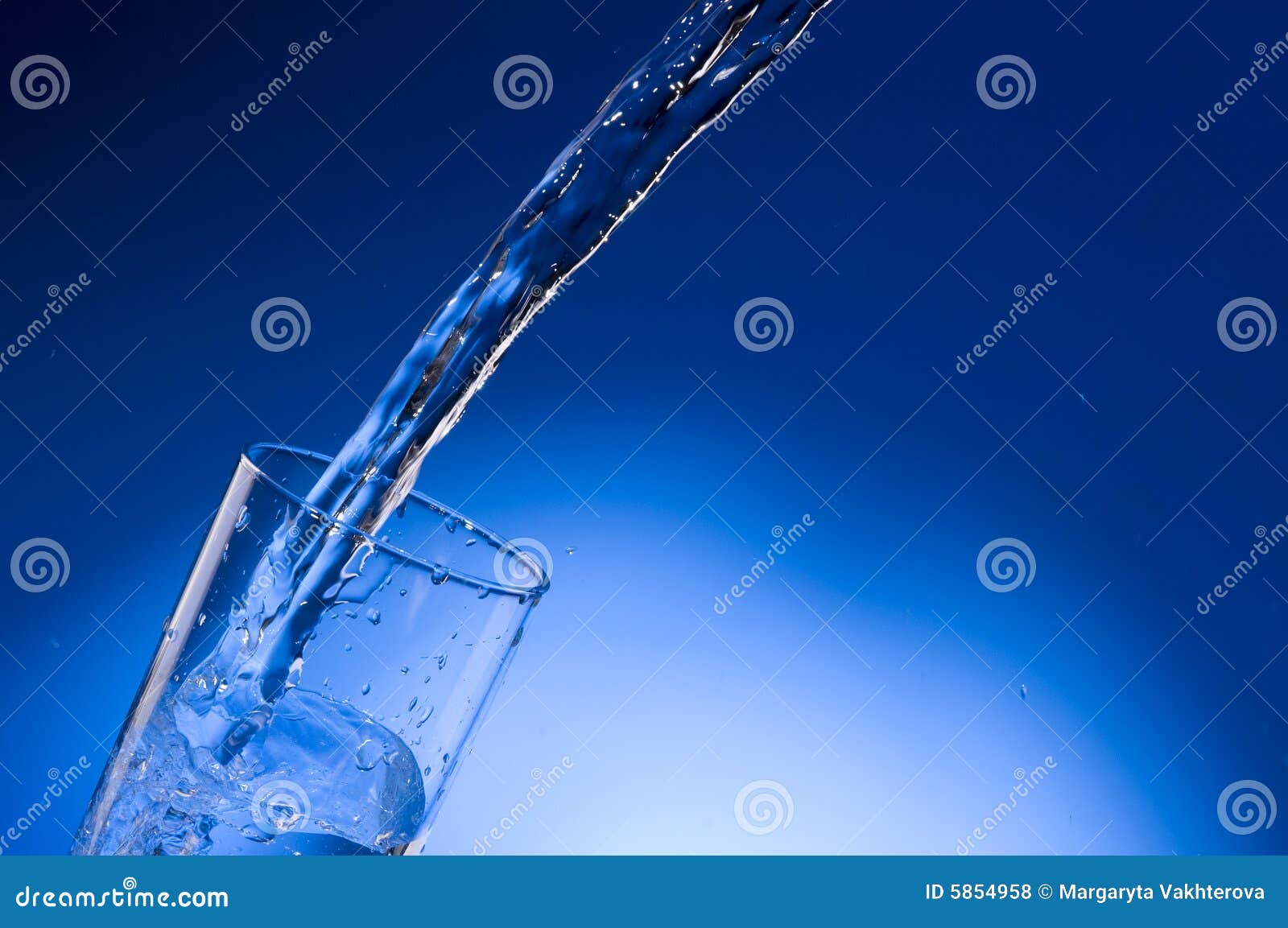 Pouring Mineral Water Stream into a Glass Stock Photo - Image of purity ...