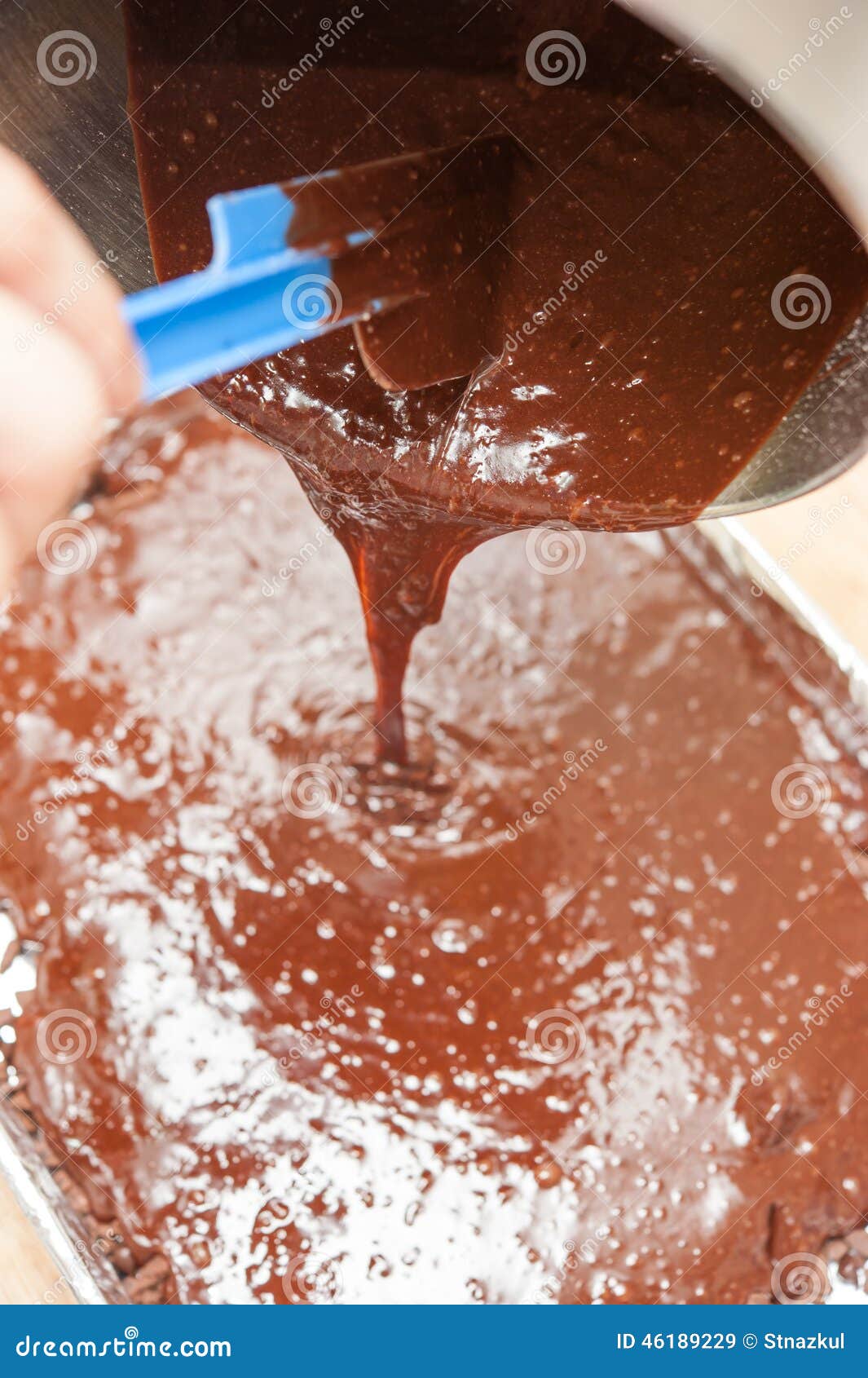 Pouring Mixture of Chocolate Eggs and Flour Stock Image - Image of ...