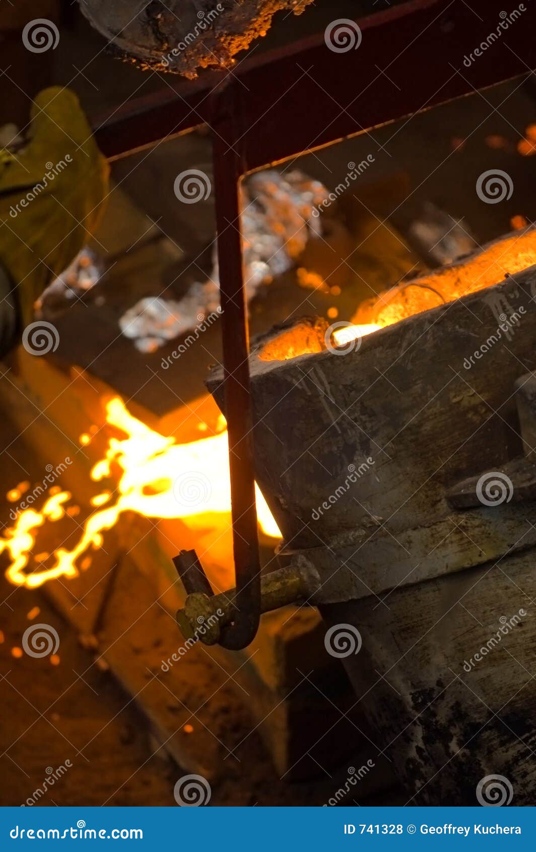 Pouring Molten Metal stock photo. Image of pour, protected - 741328