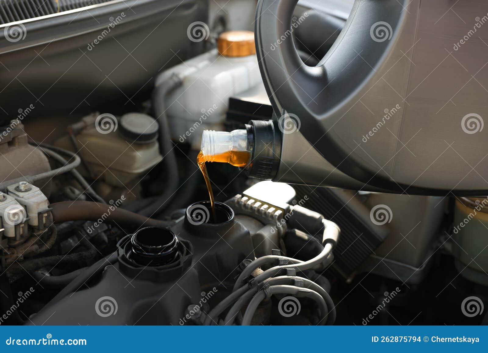 Pouring Motor Oil into Car Engine, Closeup Stock Photo - Image of ...