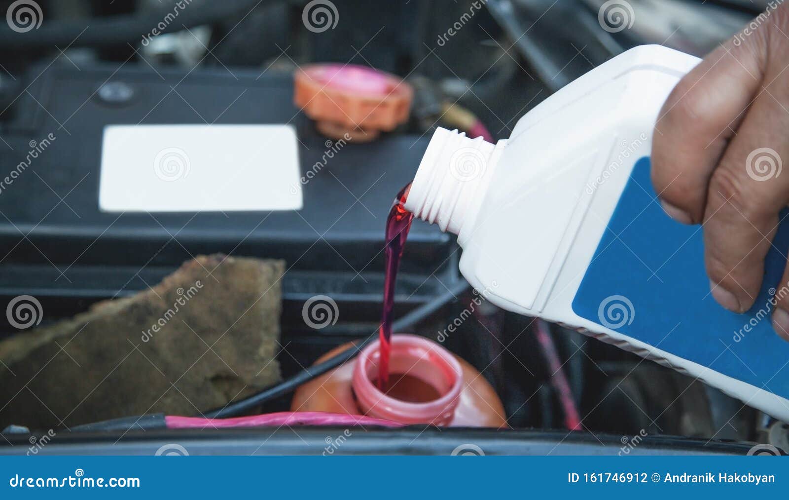 Pouring Motor Oil into the Engine Stock Photo - Image of pour, repair ...