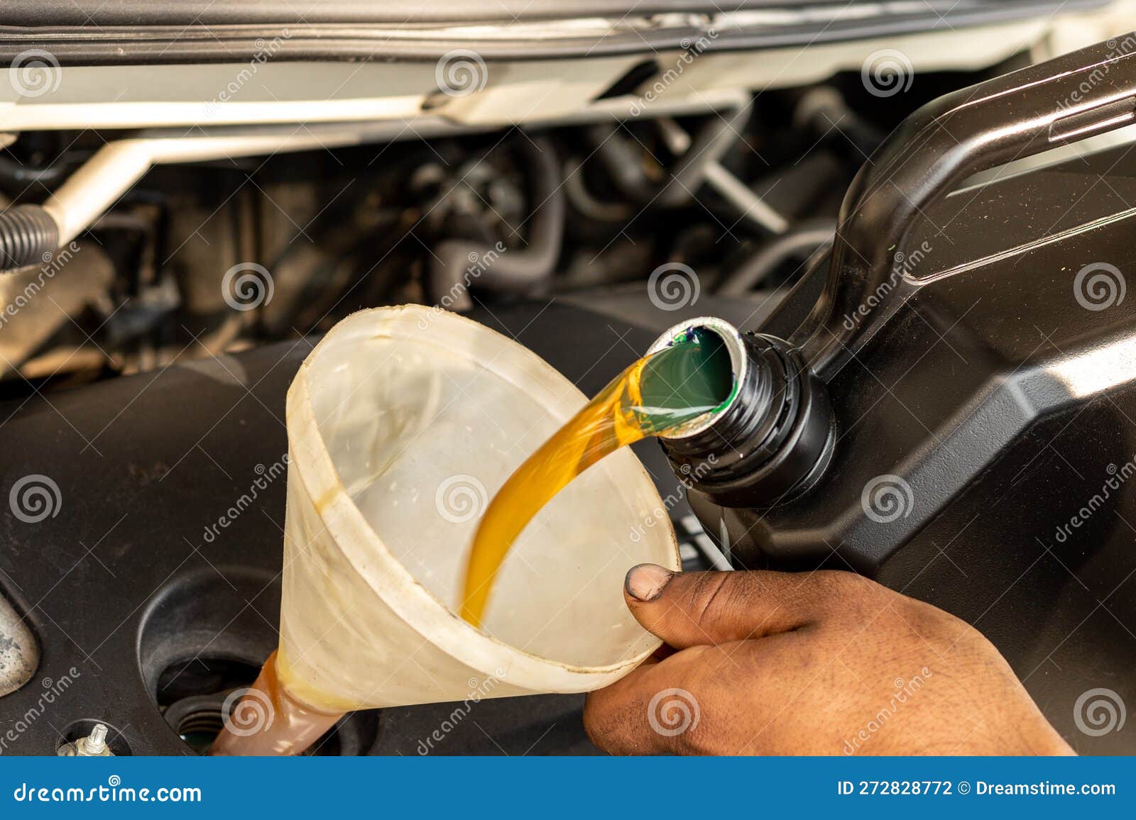 Pouring New Engine Oil into the Vehicle Engine Stock Photo - Image of ...