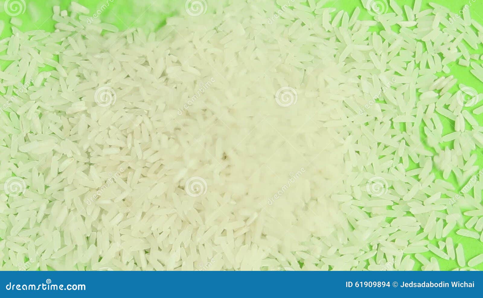 Pouring rice on isolated stock footage. Video of handful - 61909894