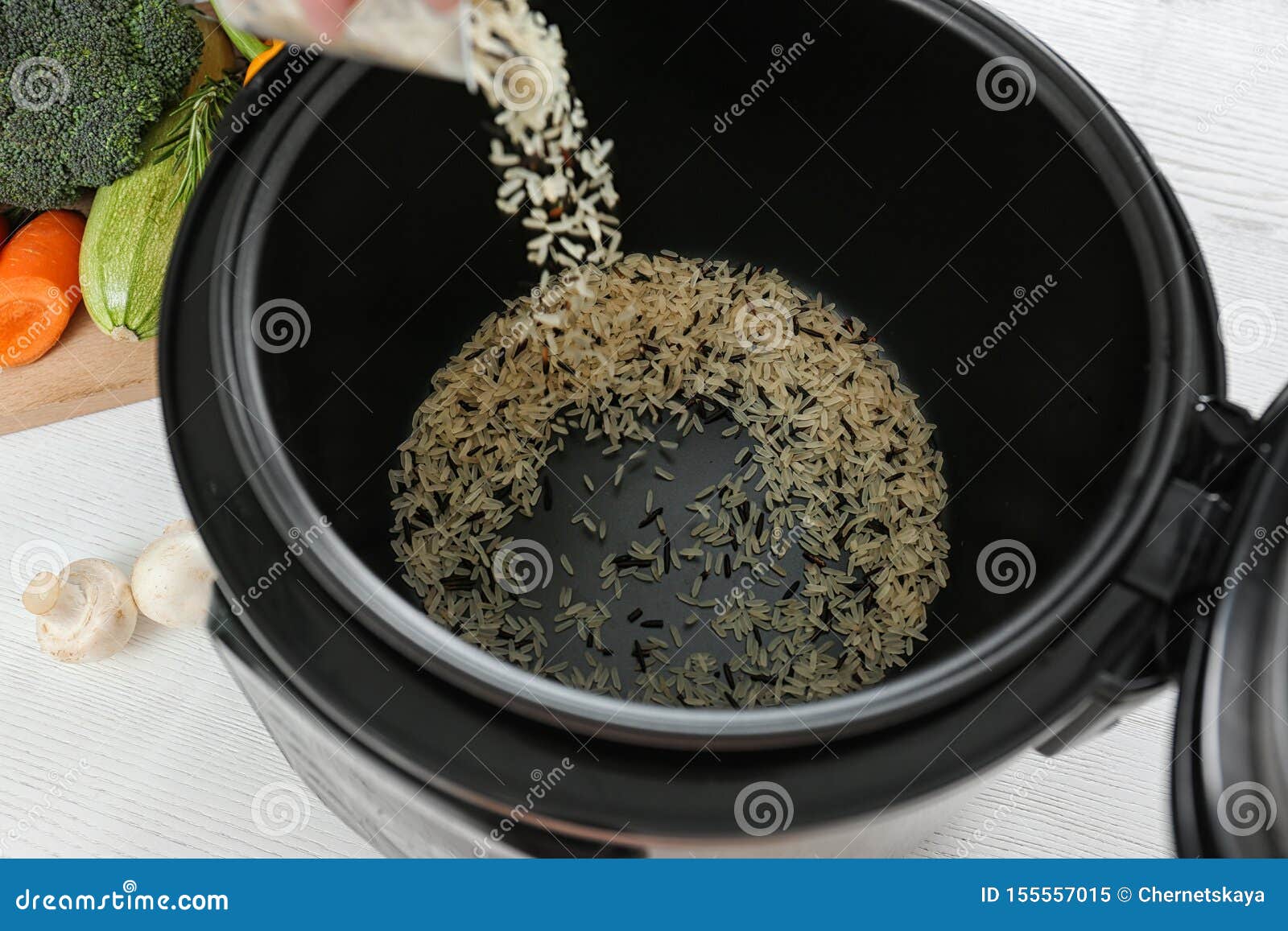 Pouring Rice into Modern Multi Cooker Stock Image - Image of closeup ...