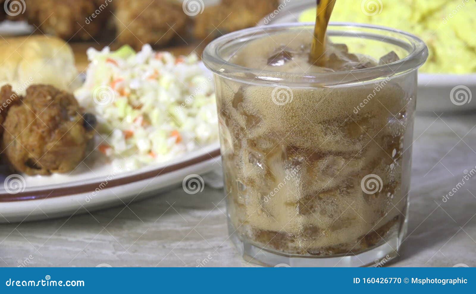 Pouring Root Beer in a Glass of Ice, Slow Motion Stock Footage - Video ...