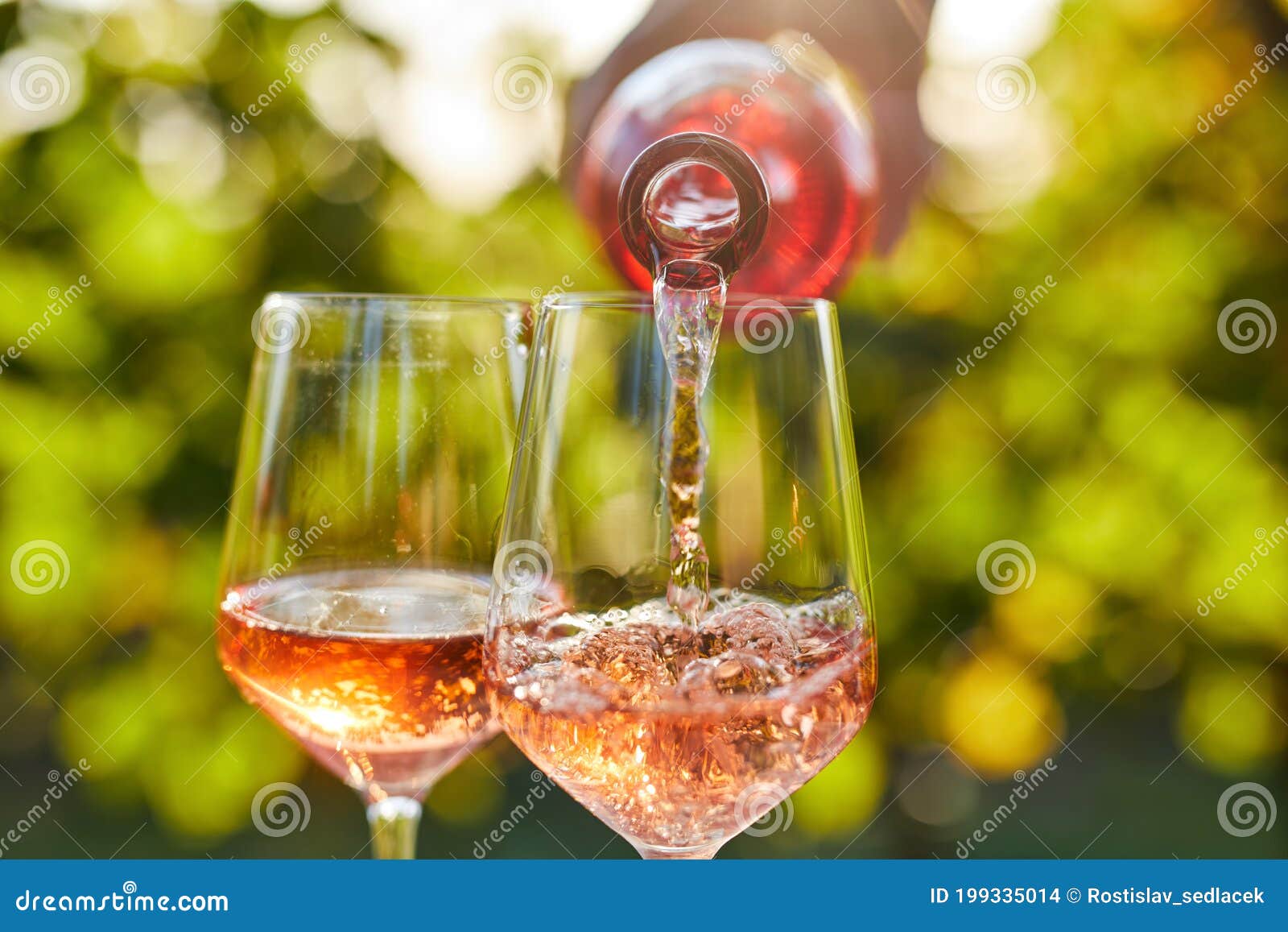 Pouring Rose Wine into Glasses Stock Photo - Image of restaurant, rose ... Pouring Rose Wine into Glasses Stock Photo - Image of restaurant, rose ...