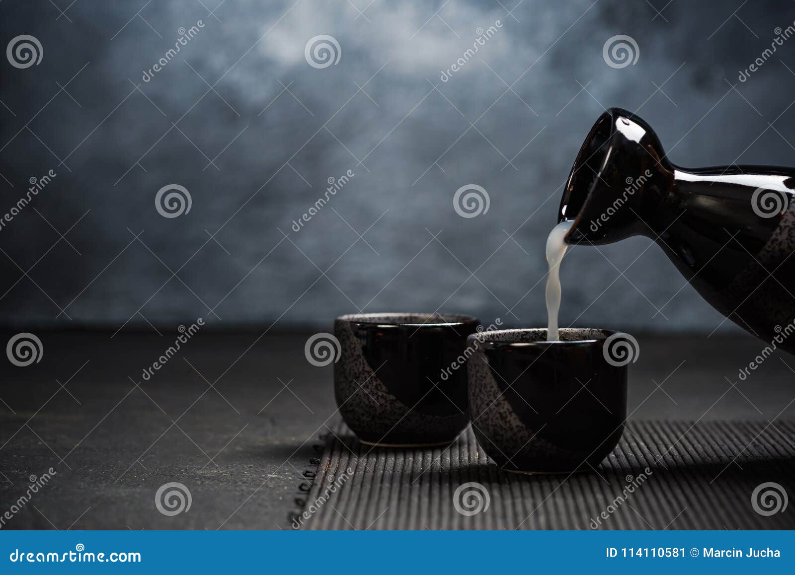 Pouring Sake into Sipping Ceramic Bowl Stock Image - Image of porcelain ...