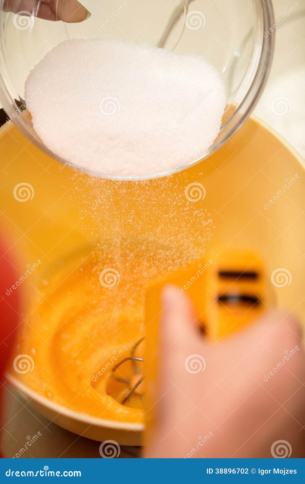 Pouring sugar into bowl stock photo. Image of domestic - 38896702
