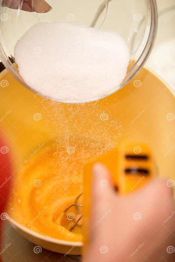 Pouring sugar into bowl stock photo. Image of domestic - 38896702