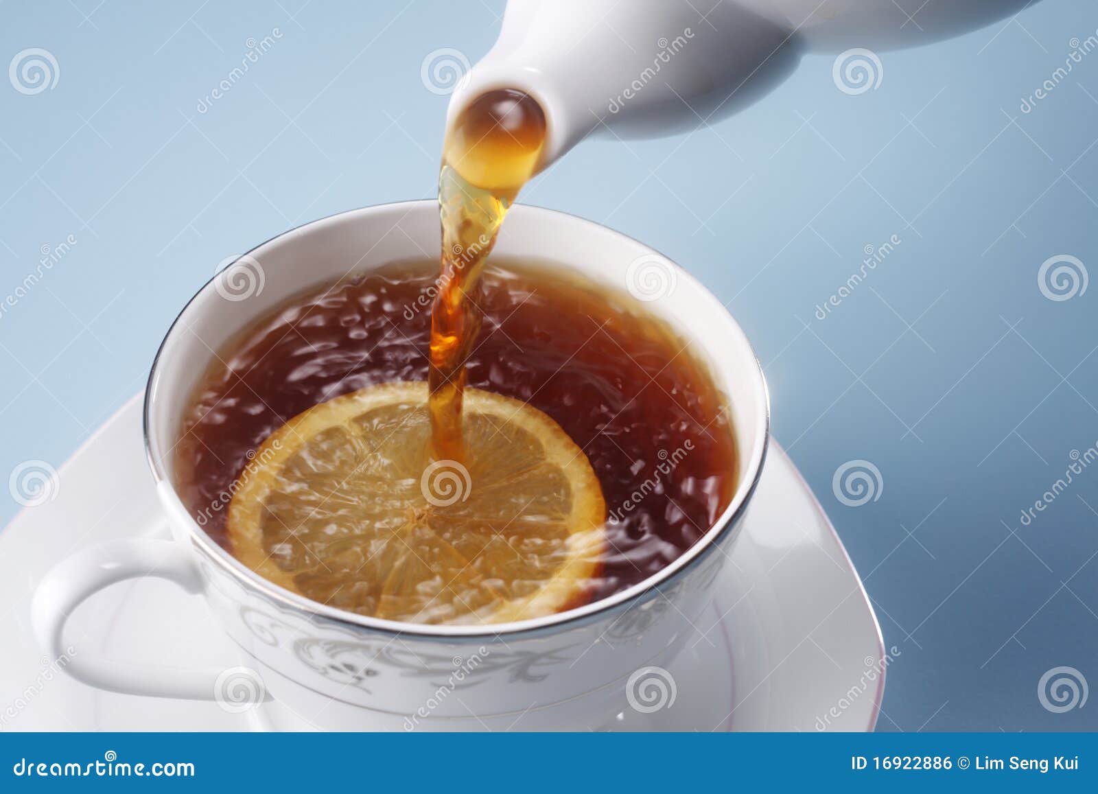Pouring tea stock photo. Image of white, caffeine, pour - 16922886