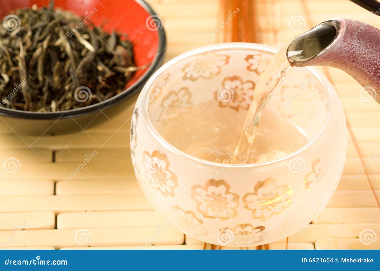 Pouring Tea stock photo. Image of bowl, brew, ornamental - 6921654