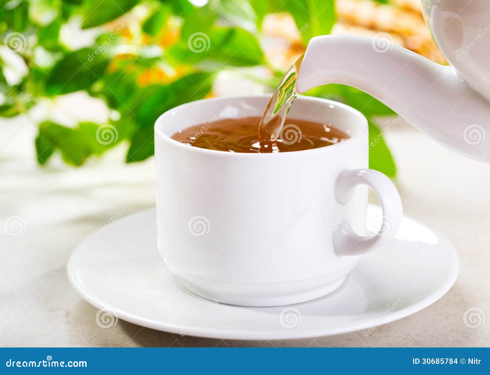 Pouring tea stock photo. Image of breakfast, white, light - 30685784