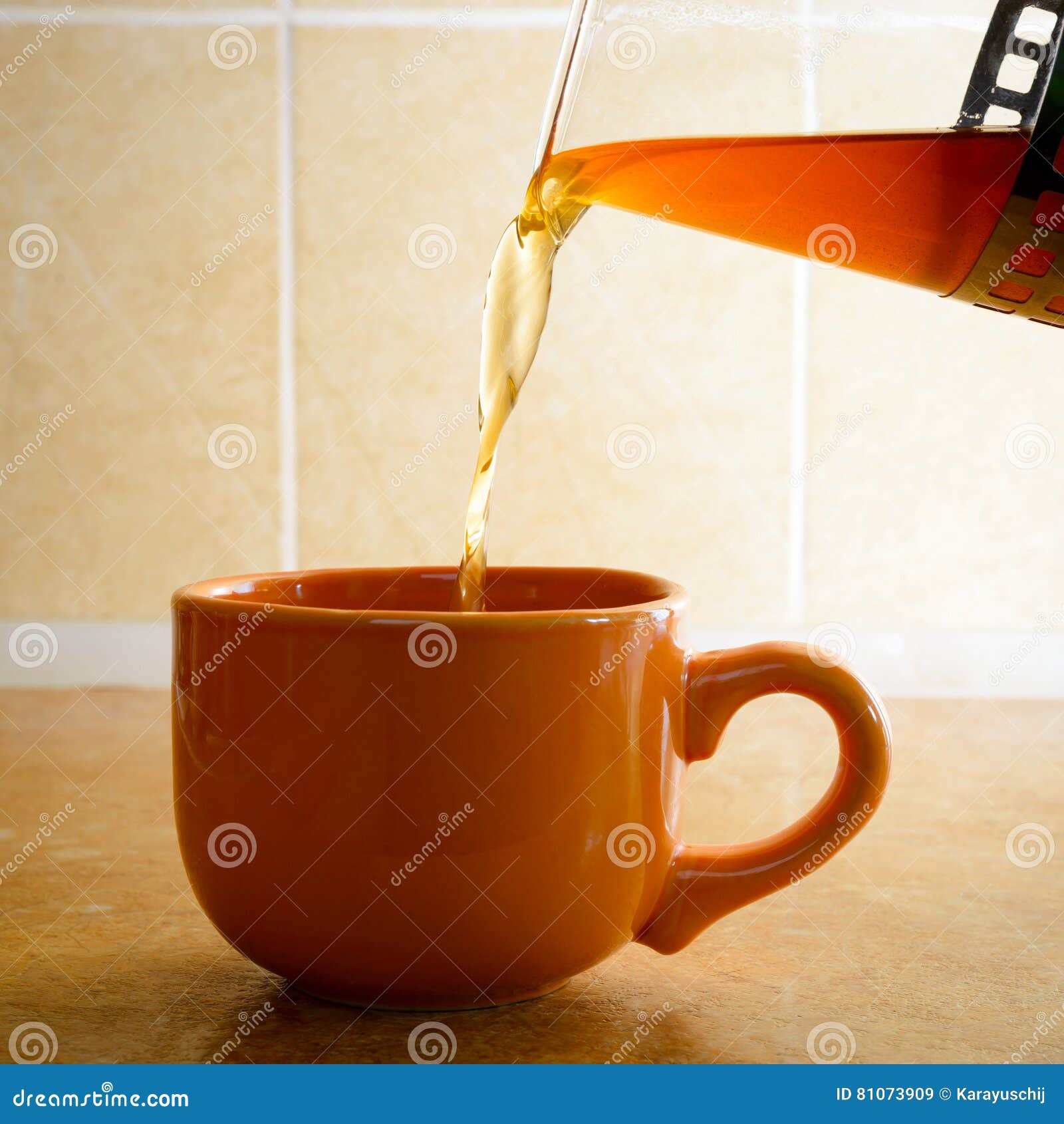 Pouring Tea in a Cup stock image. Image of healthy, pouring - 81073909
