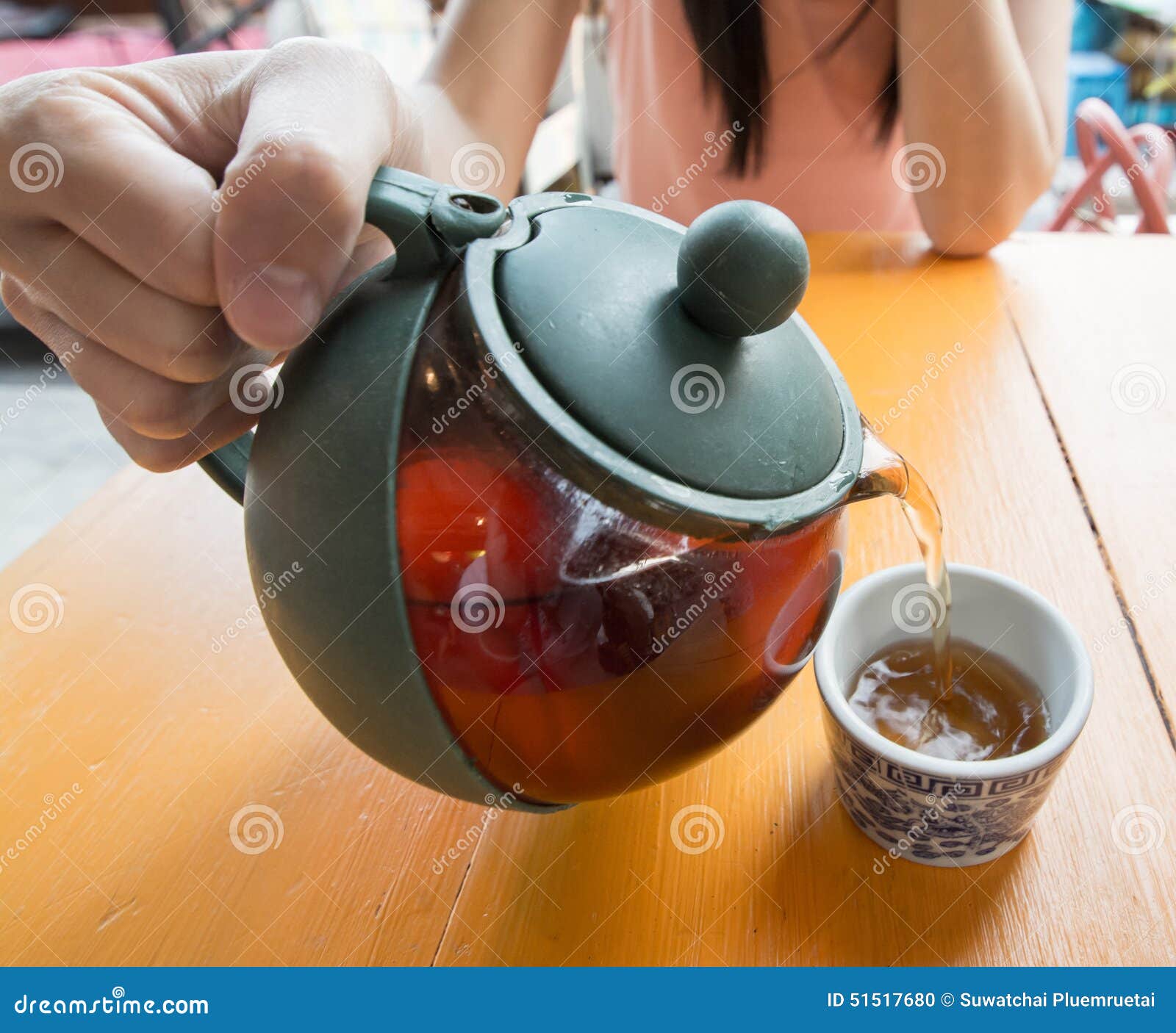 Pouring Tea into Cup of Tea Stock Photo - Image of light, freshness ...