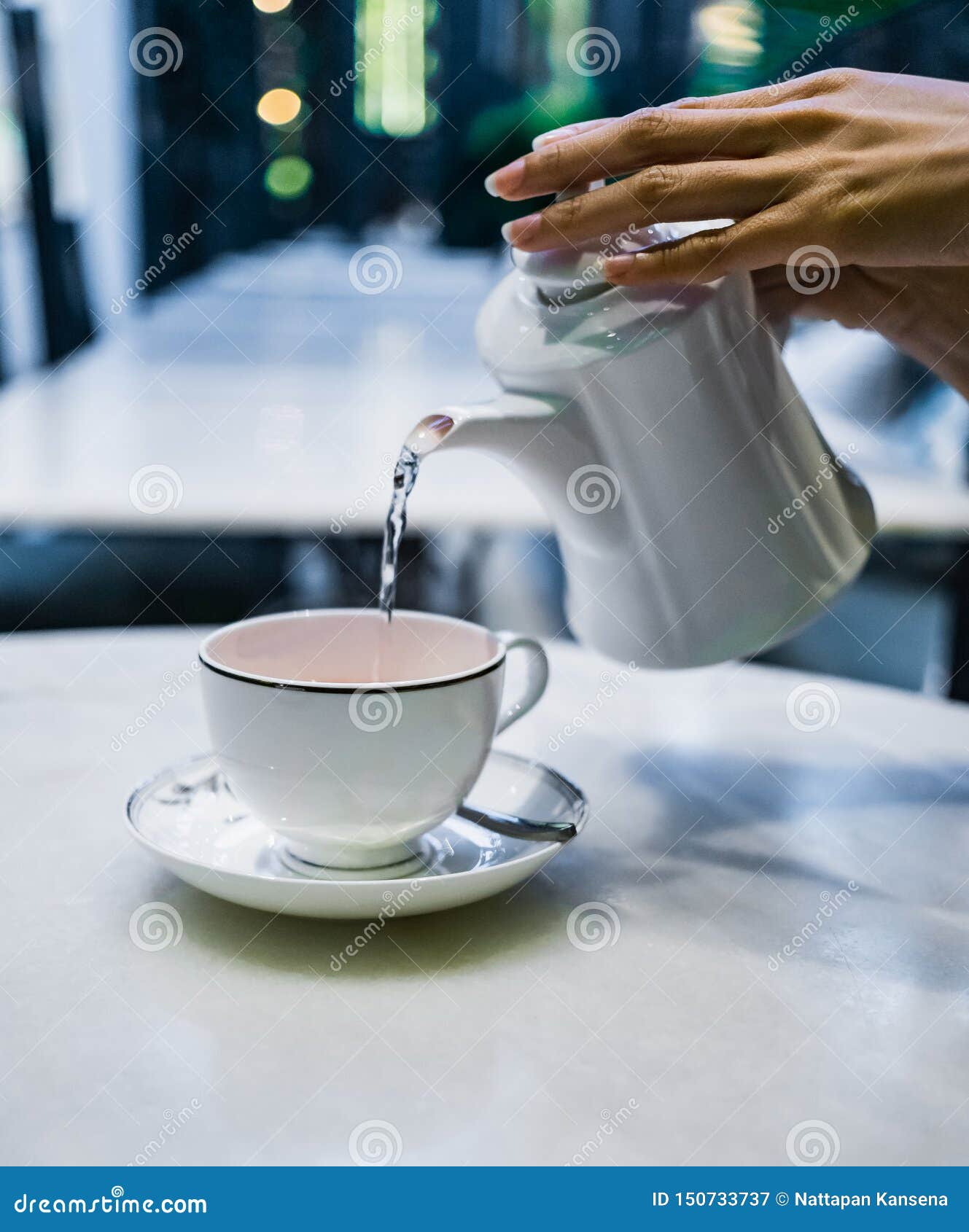 Pouring tea stock image. Image of refreshment, black - 150733737
