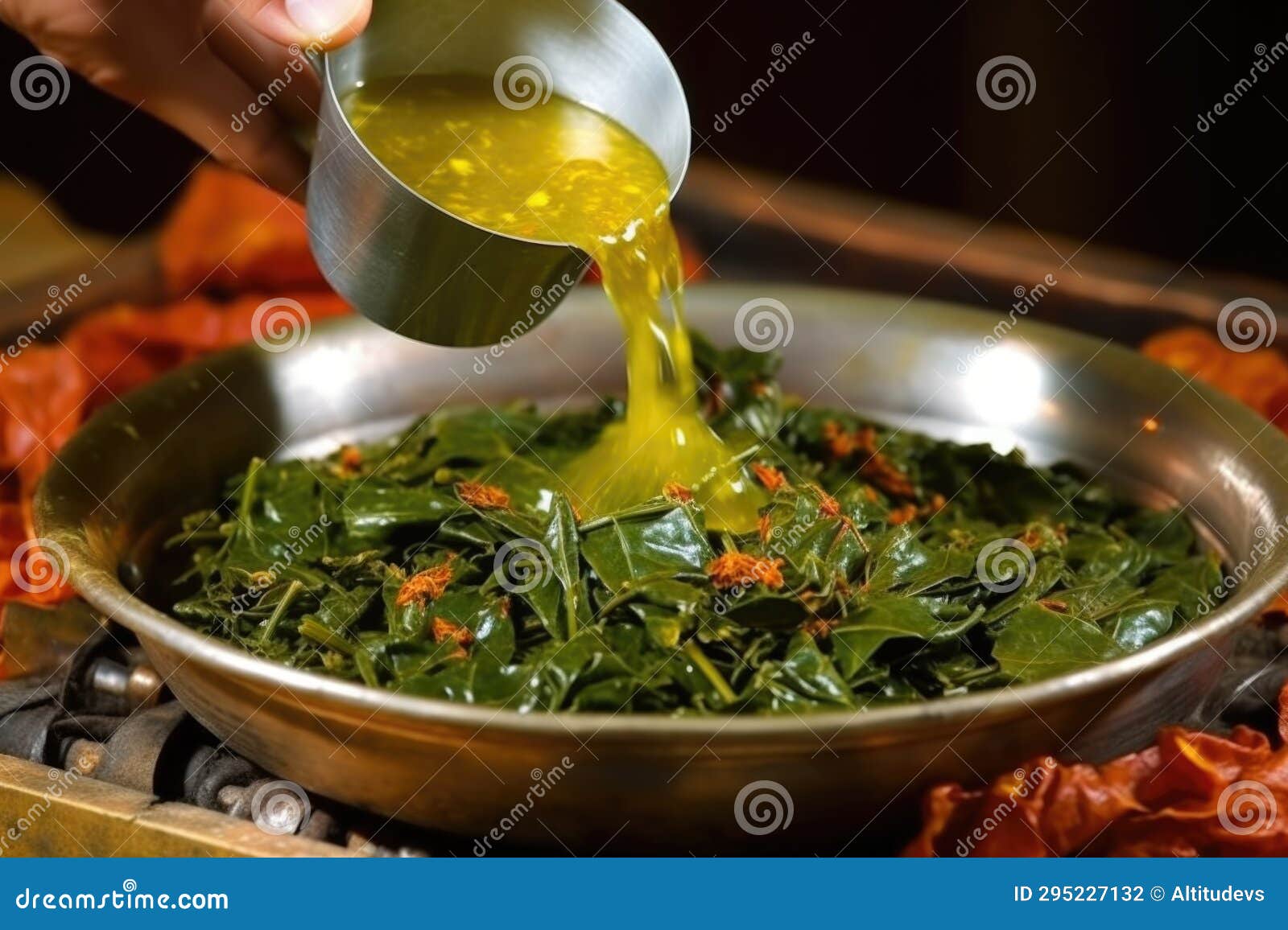 Pouring a Tomato Puree into the Pan of Saag Aloo by Hand Stock Photo ...