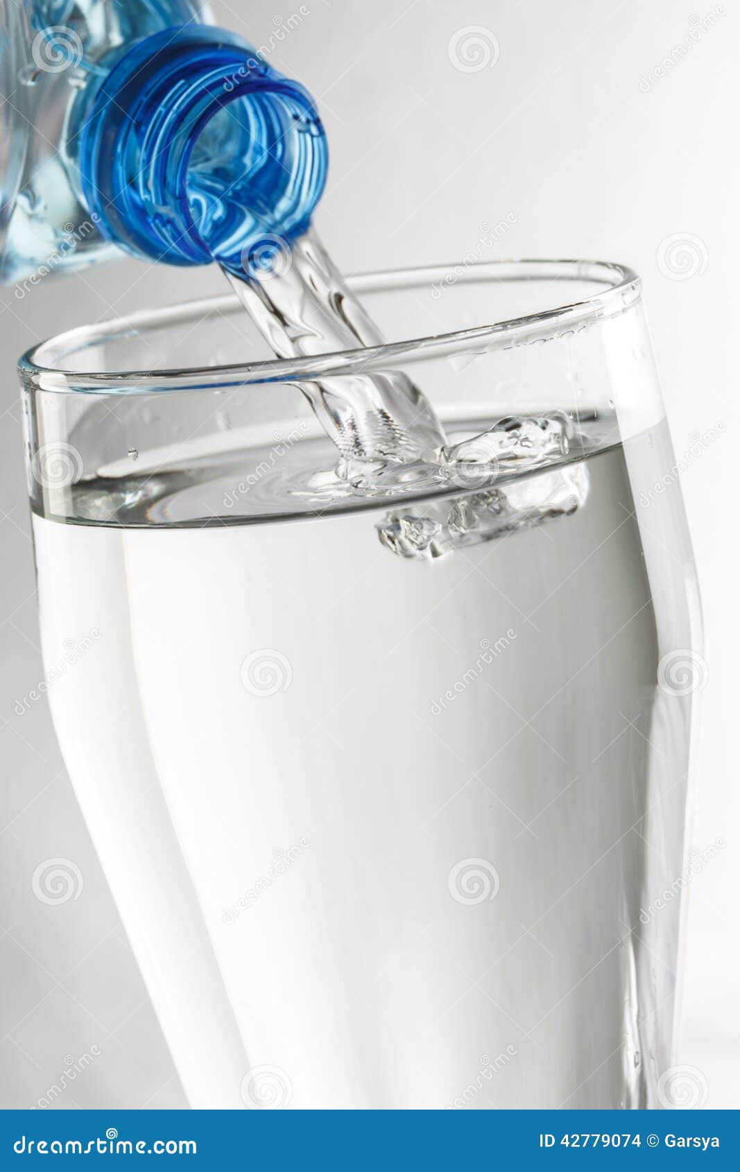 Pouring water from bottle stock photo. Image of fresh - 42779074