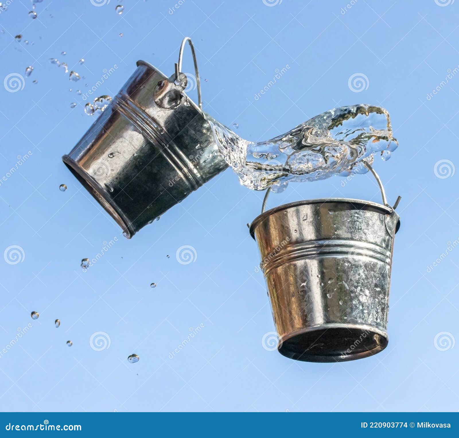 A Pouring Water from Falling Bucket To Bucket Stock Photo - Image of ...