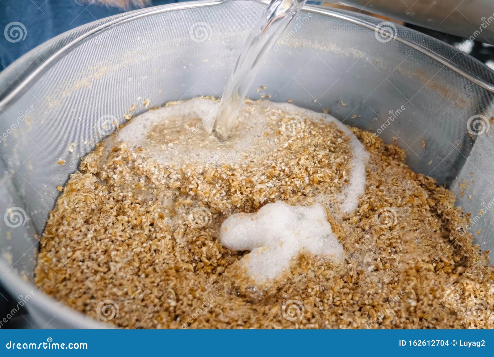 Pouring Water into Ground Barley Stock Photo - Image of organic ...