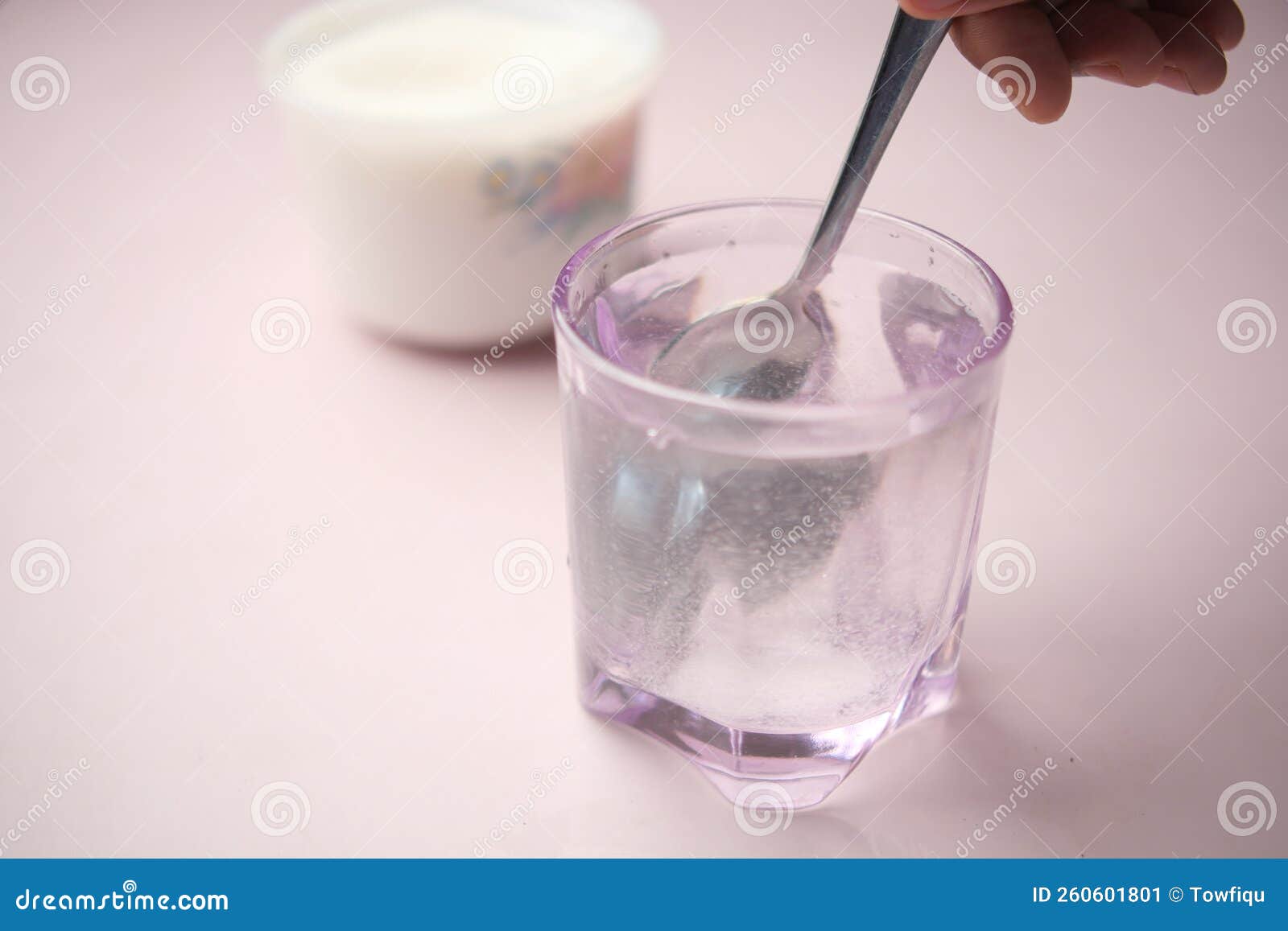 Pouring White Sugar in a Glass of Water on Table Stock Image - Image of ...