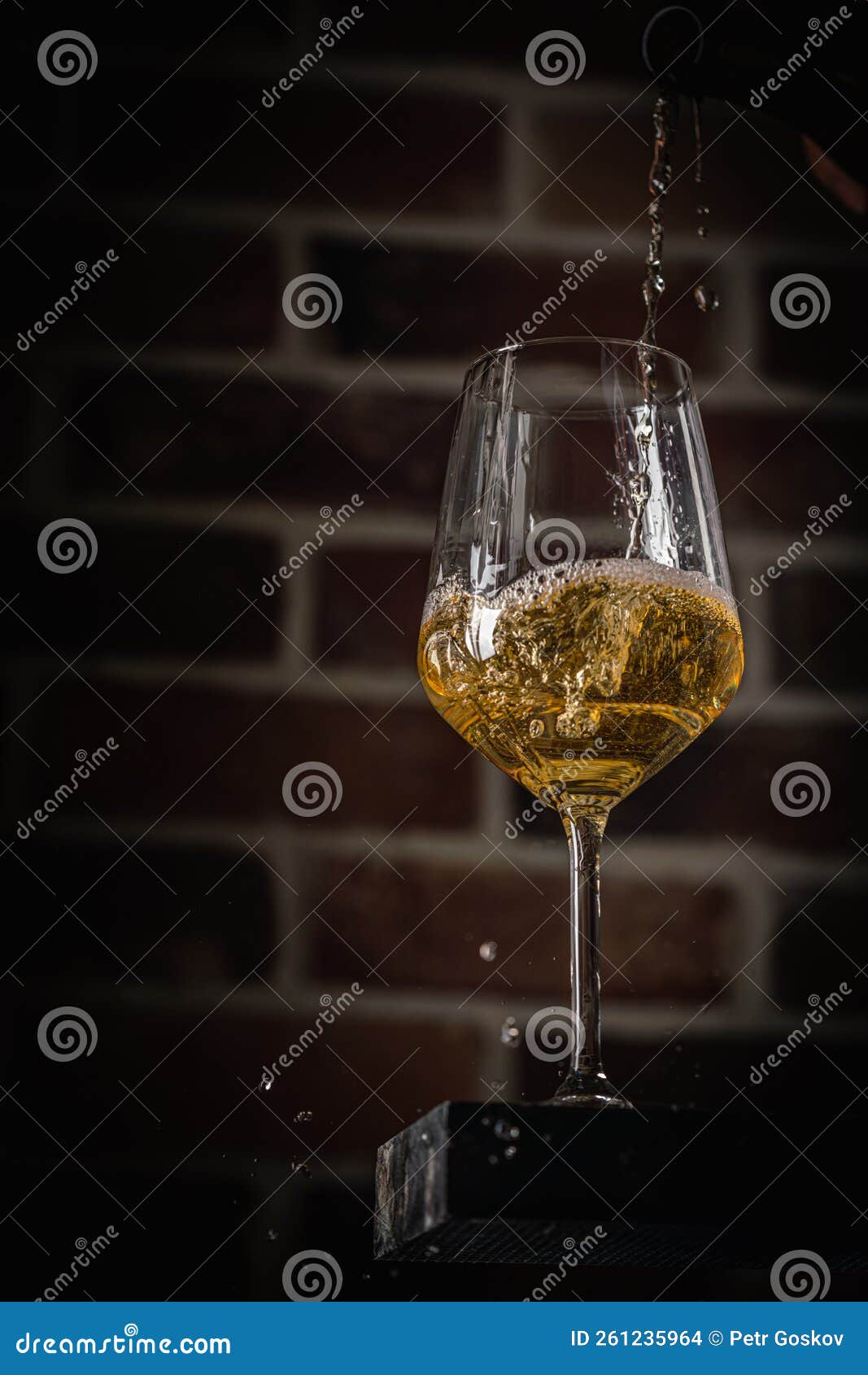 Pouring white wine stock photo. Image of celebrate, winery - 261235964