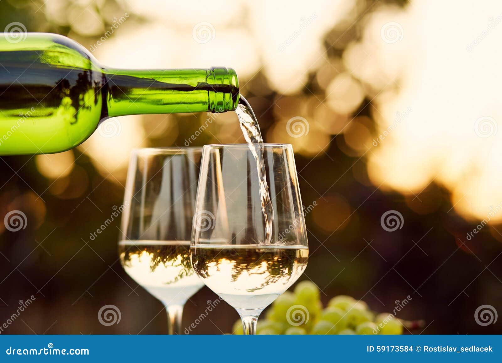 Pouring white wine stock photo. Image of wine, alcoholic - 59173584