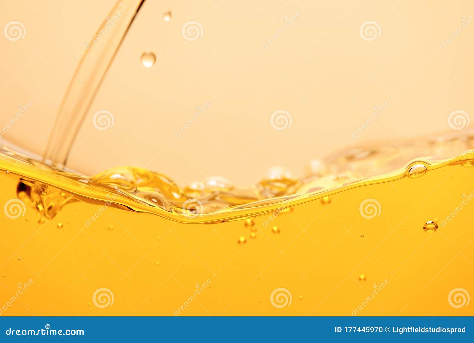 Yellow Bright Liquid with Splash and Stock Photo - Image of aqua ...