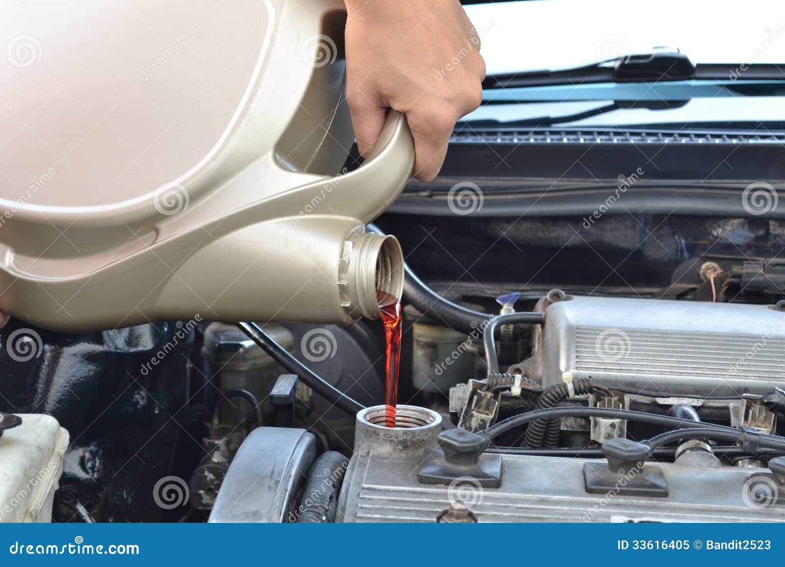 Pours Fresh Oil into a Car Engine Stock Image - Image of lubricant ...