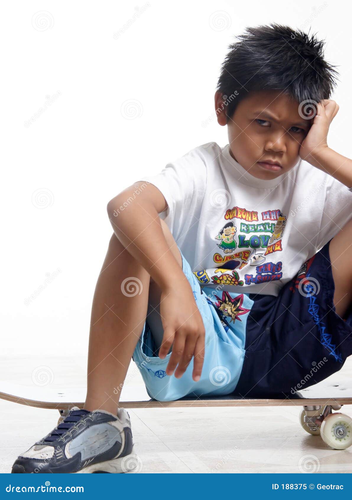 Pouting Boy Sitting on His Skateboard Stock Image - Image of pout ...