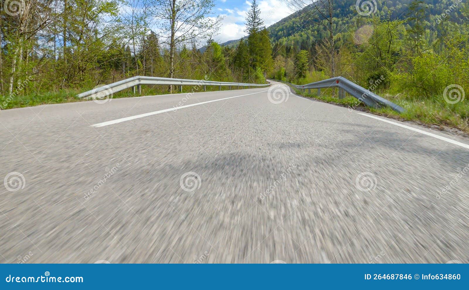 POV: Cool Shot of Driving Along Empty Road Winding through the Lush ... POV: Cool Shot of Driving Along Empty Road Winding through the Lush ...