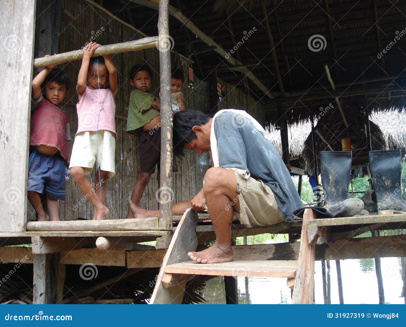 Poverish family editorial stock image. Image of house - 31927319