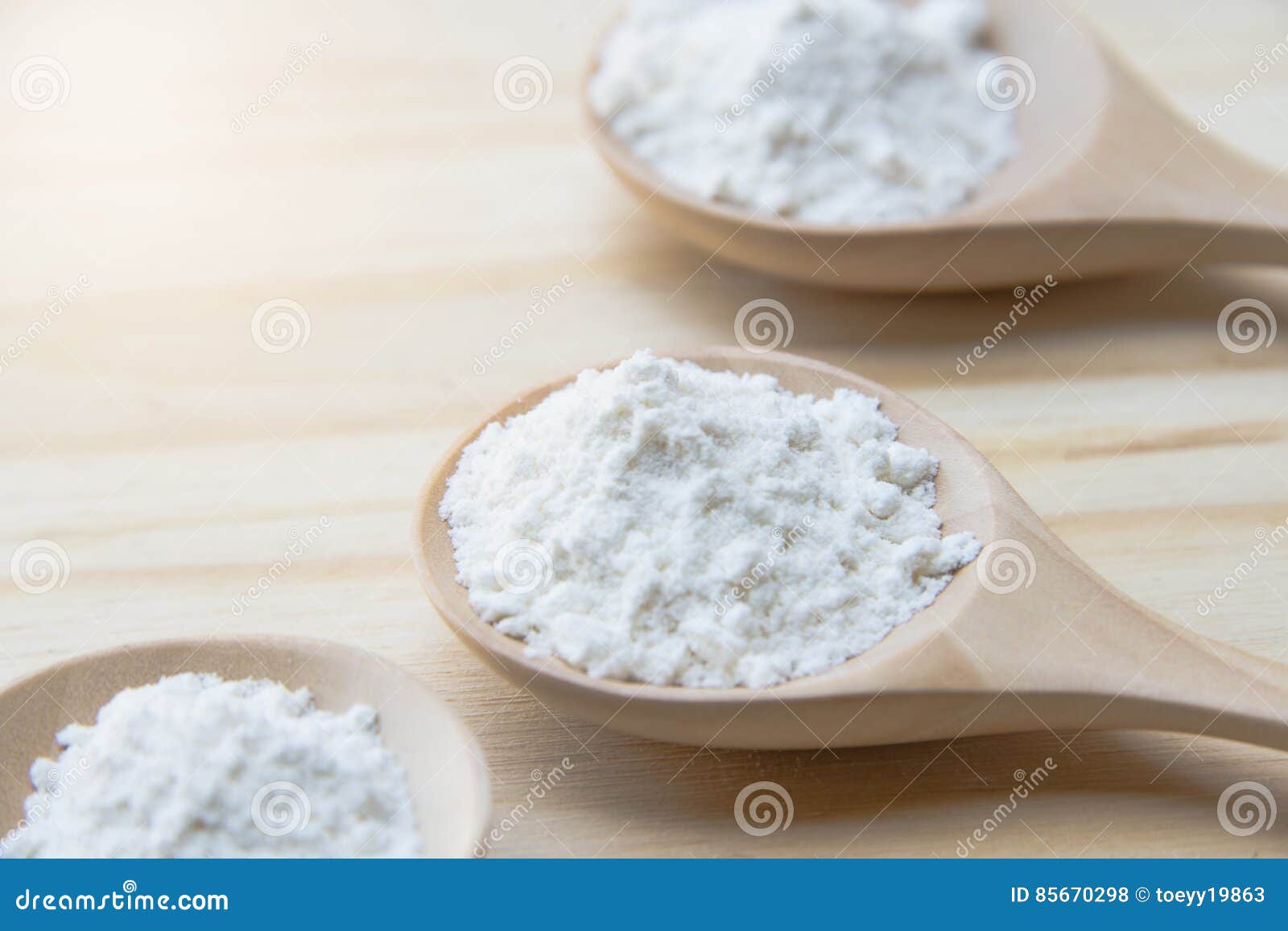 Powder in the wooden spoon stock photo. Image of powdered - 85670298