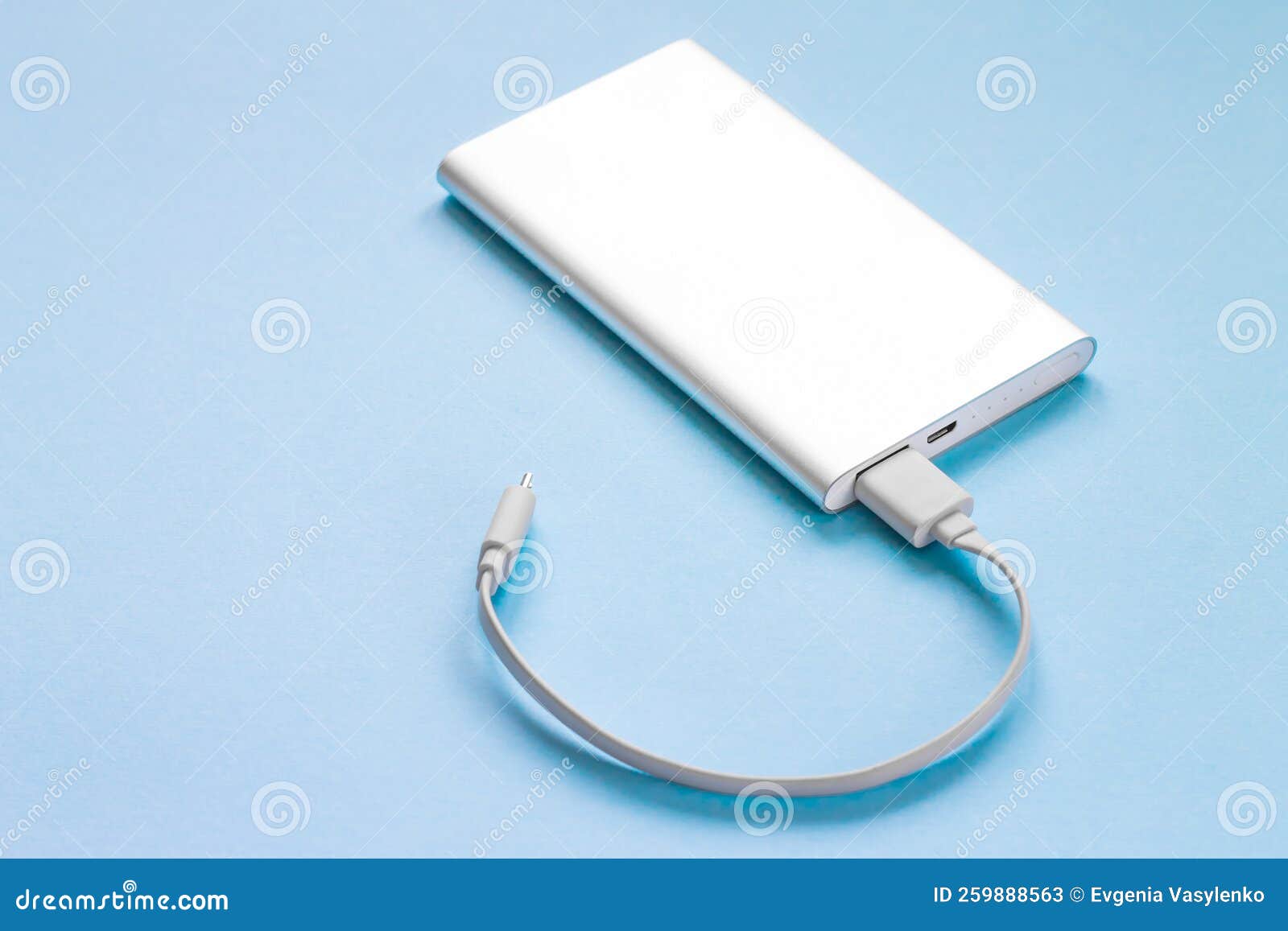 Power Bank on a Blue Background. Top View of the Place for the Text ...