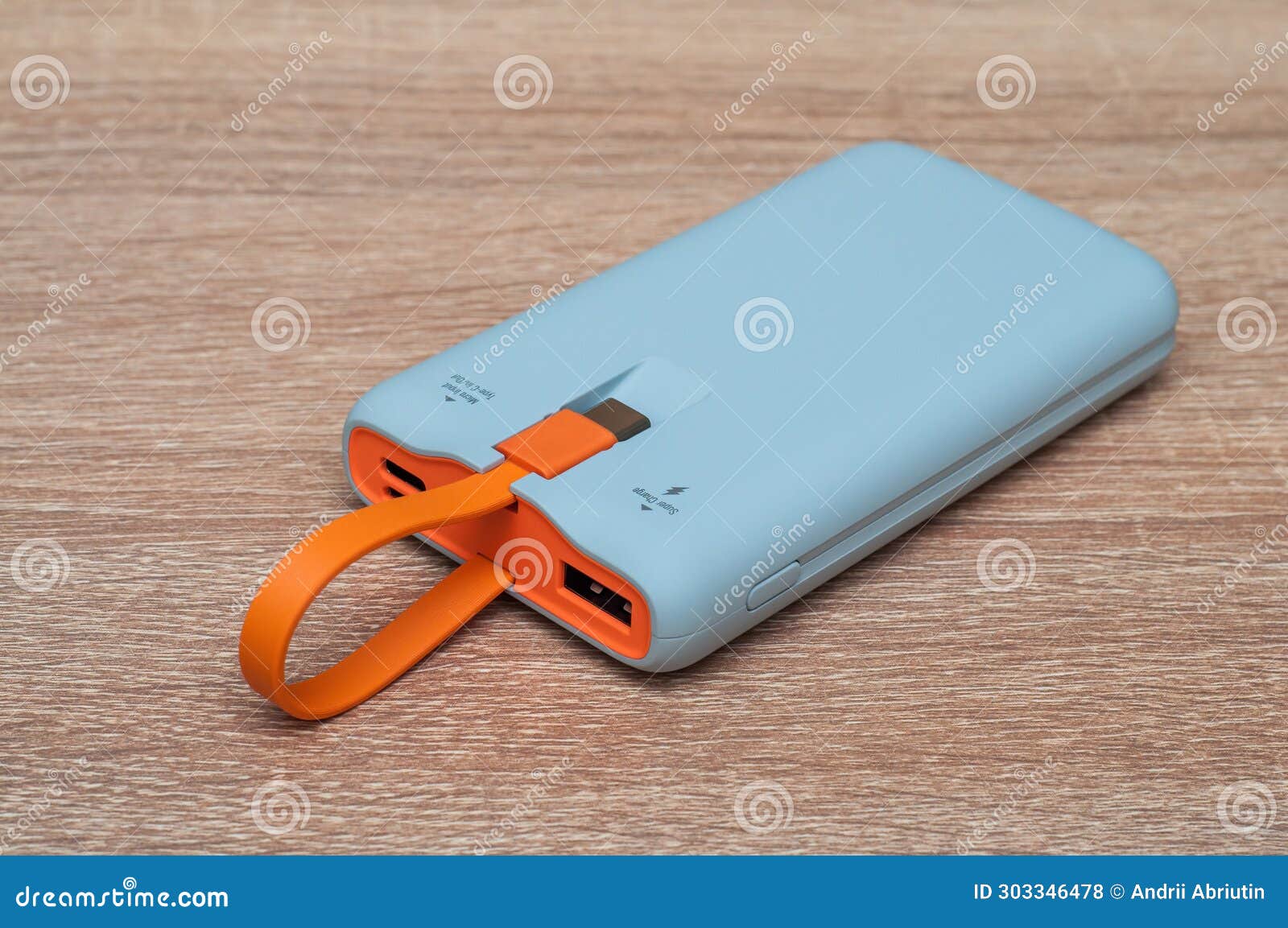 The Power Bank is Gray with an Orange USB Handle, with Connectors ...